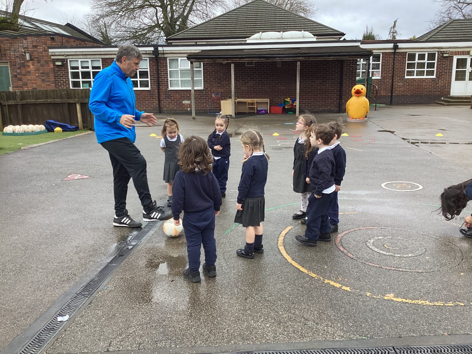 Our Nursery children practising ball skills with our Sports Coach ...